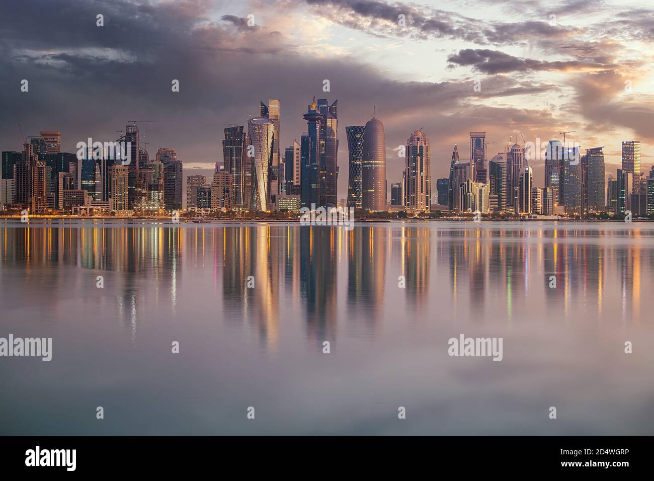 The skyline of Doha, Qatar during sunset Stock Photo - Alamy