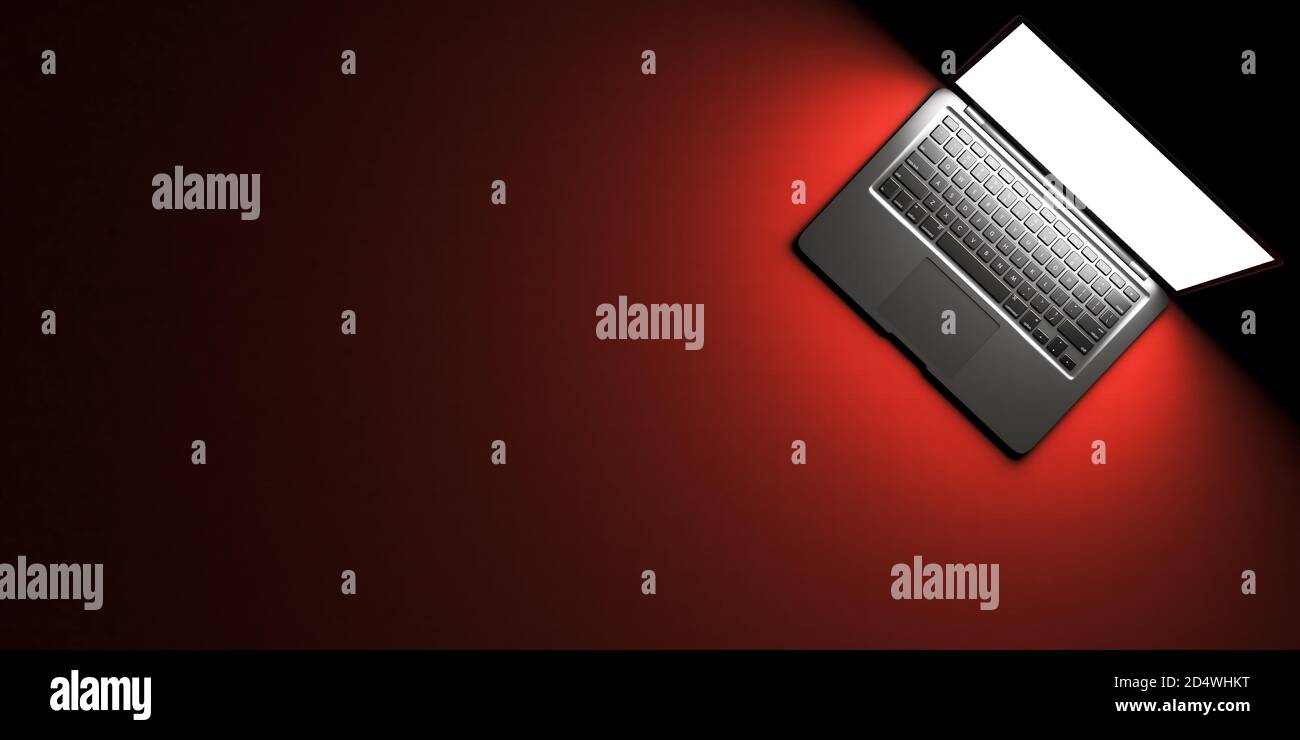 Top view of dark gray aluminum case laptop concept with red desk ...