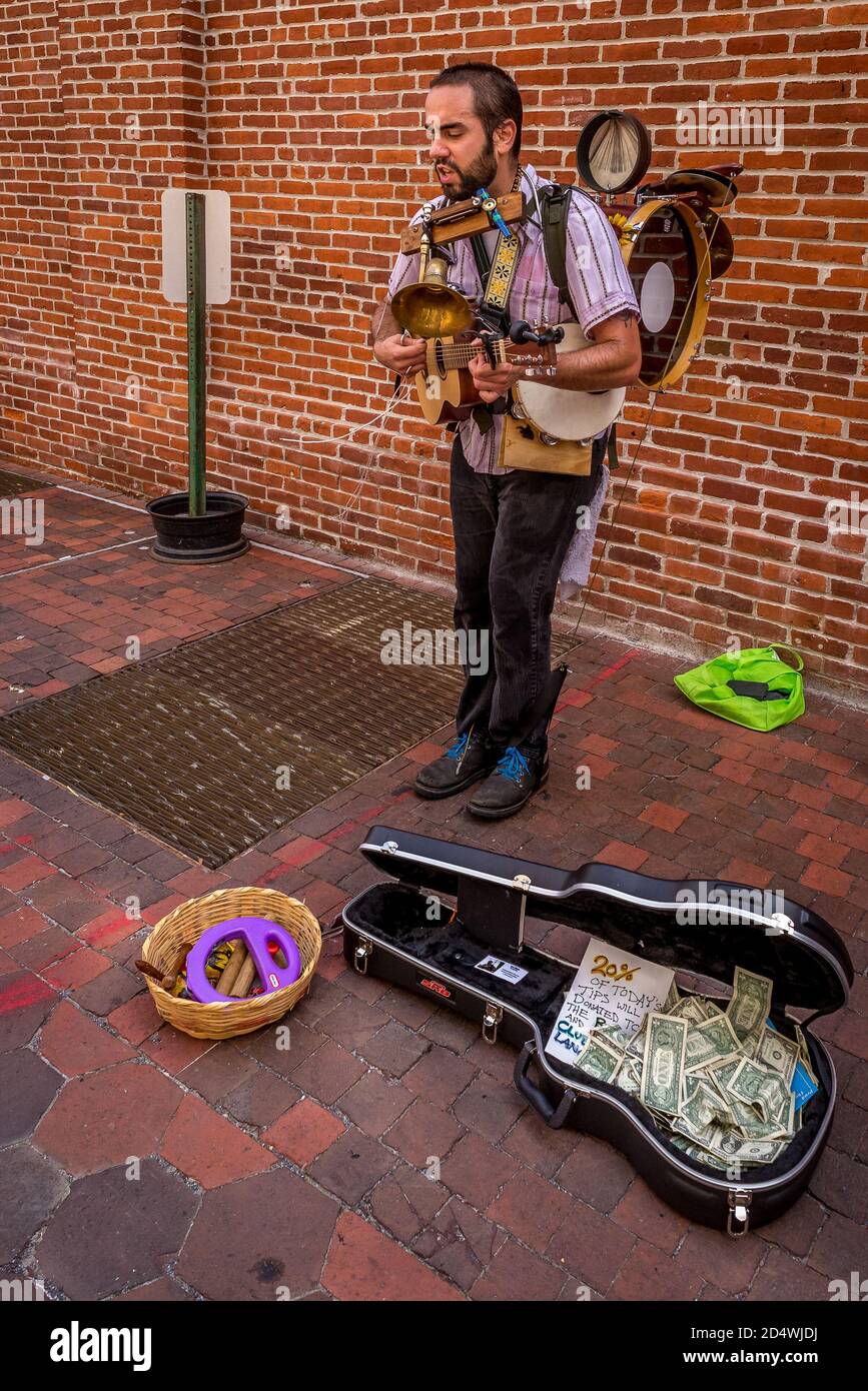 One man band, busker at Lancaster, PA. farmers market Stock Photo - Alamy