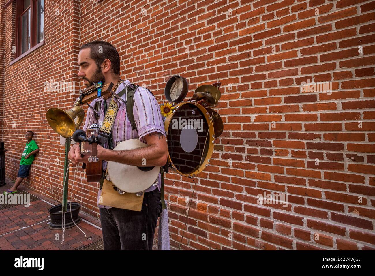 One man band, busker at Lancaster, PA. farmers market Stock Photo - Alamy