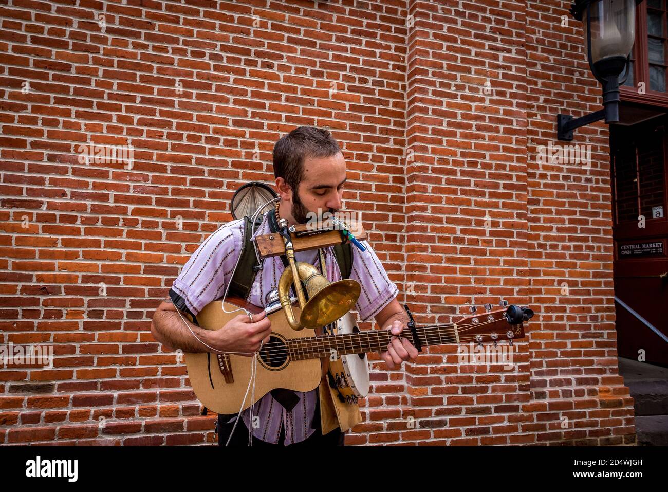 One man band, busker at Lancaster, PA. farmers market Stock Photo - Alamy