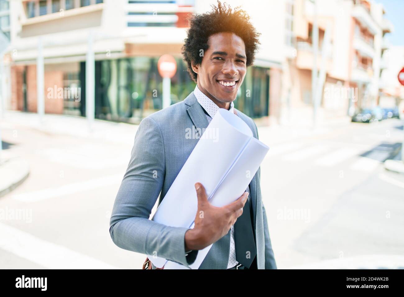 Young handsome african american architect man smiling happy. Standing ...