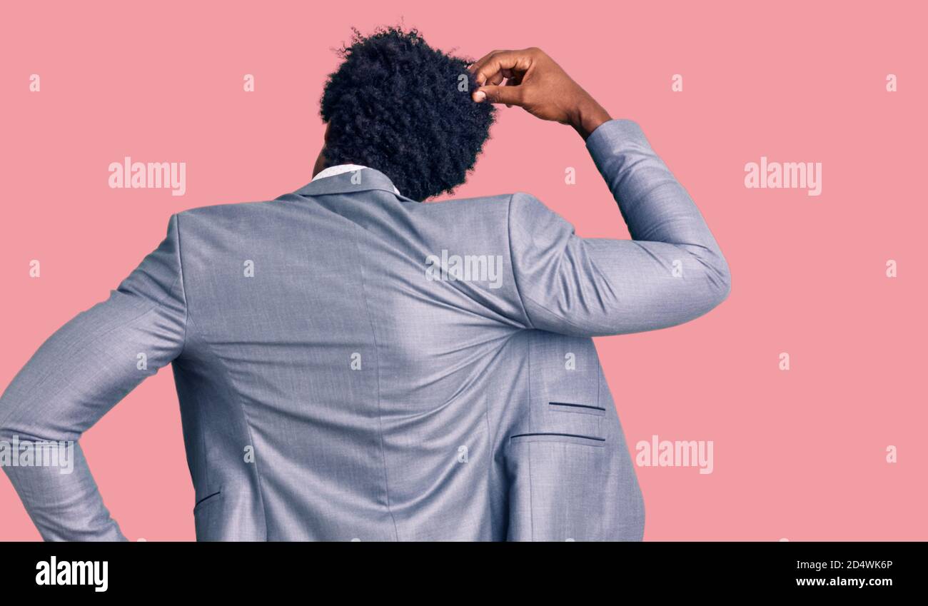 Handsome african american man with afro hair wearing business jacket ...