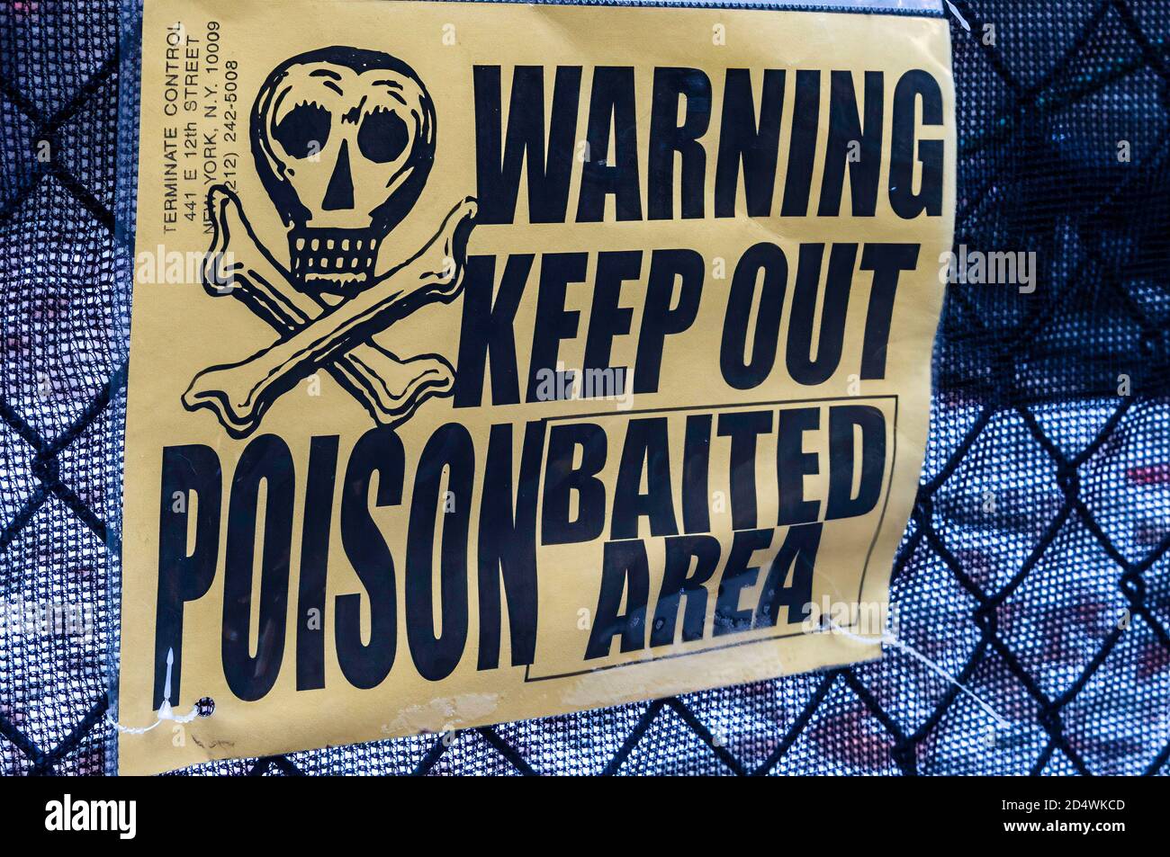 Warning, keep out, potion baited area sign Stock Photo - Alamy