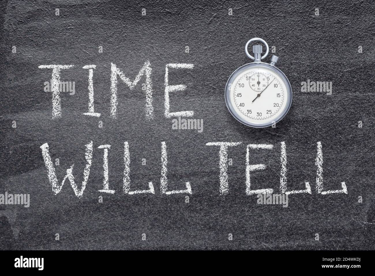 time will tell saying written on chalkboard with vintage precise ...