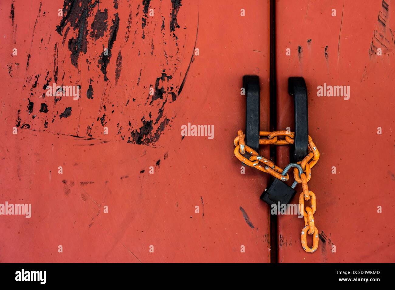 Yellow chain with black padlock secure weather metallic doors Stock ...