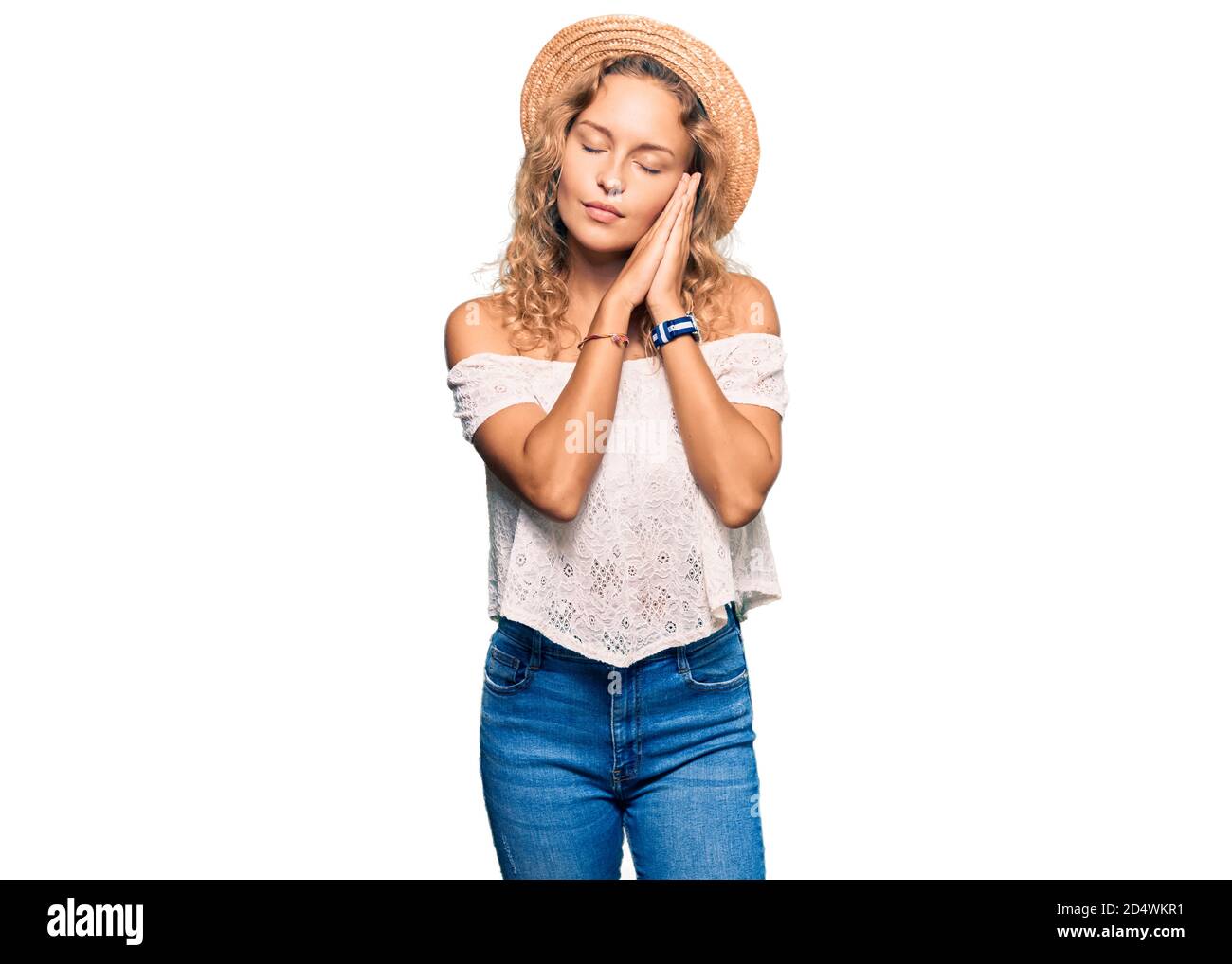 Beautiful caucasian woman wearing summer hat sleeping tired dreaming ...