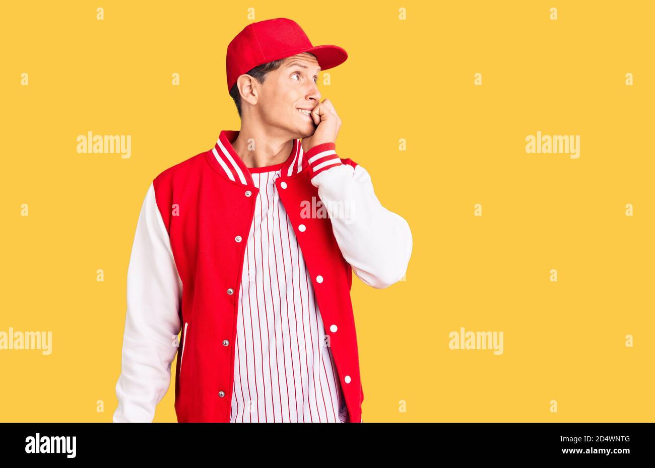 Young handsome man wearing baseball uniform looking stressed and ...