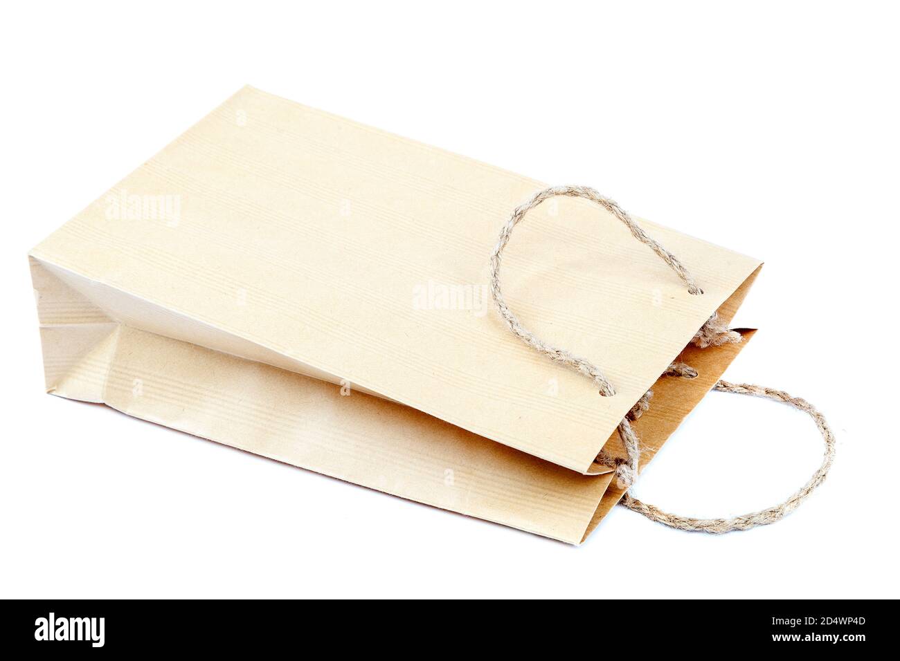 Paper bag with rope handles isolated on white background Stock Photo ...