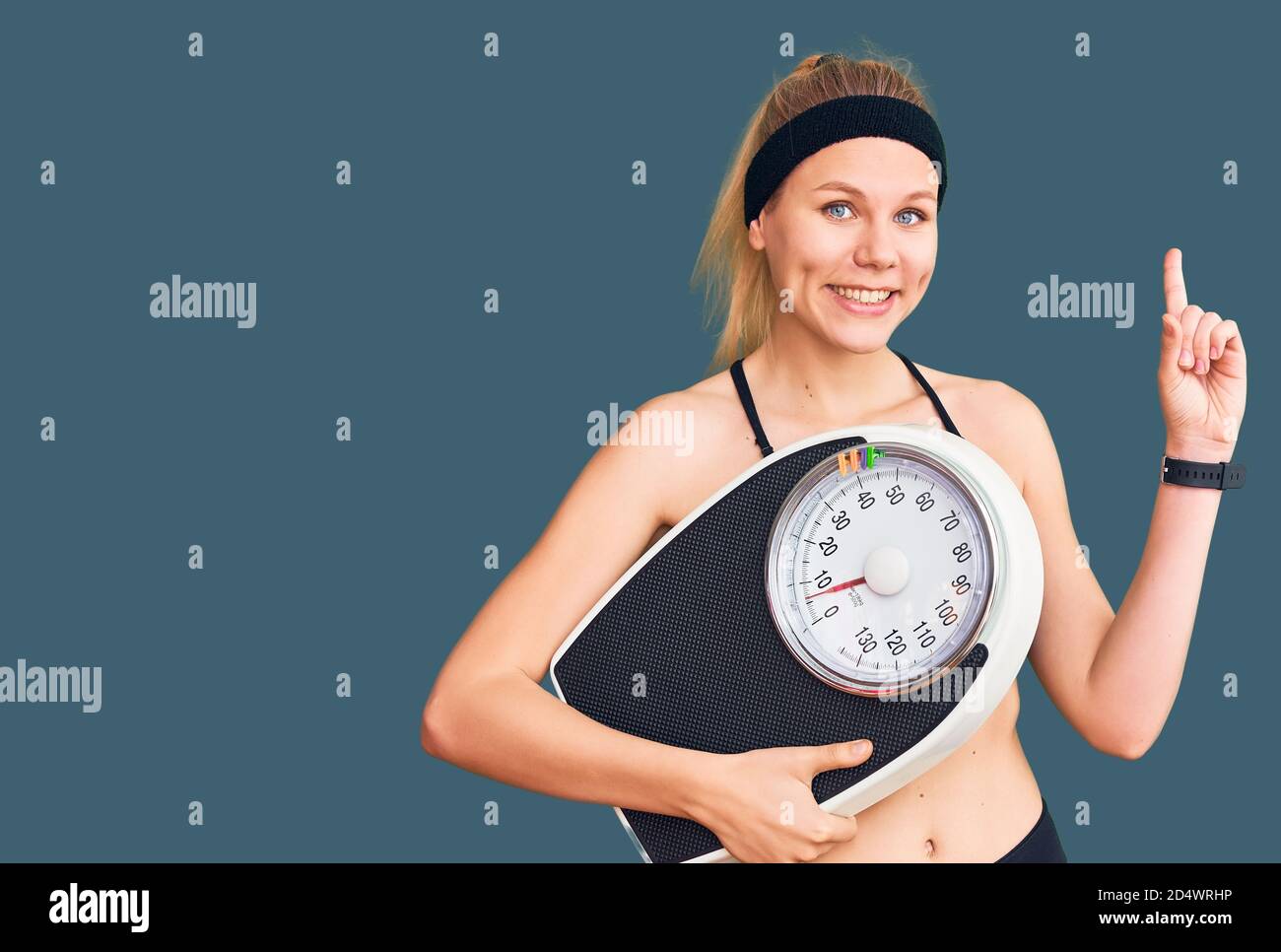 Scale weight happy face hi-res stock photography and images - Alamy