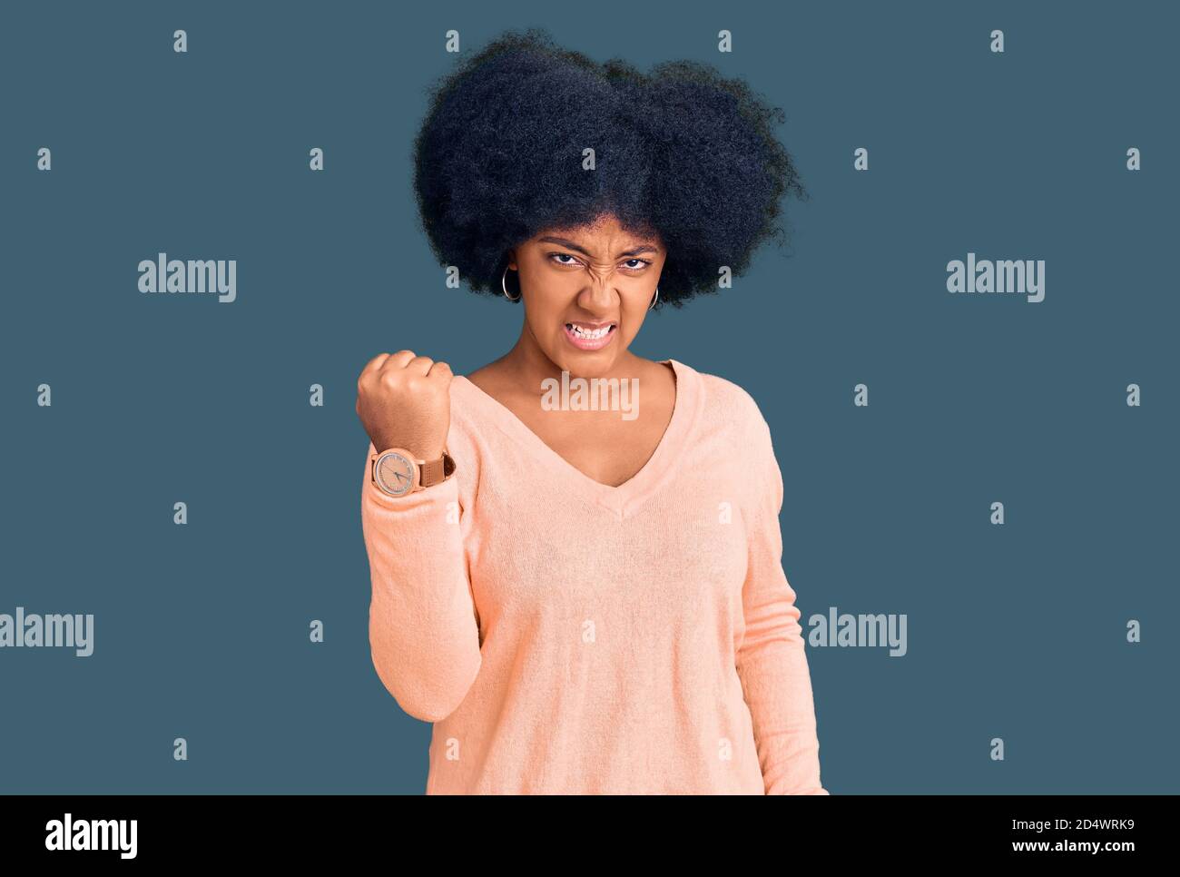 Young african american girl wearing casual clothes angry and mad ...