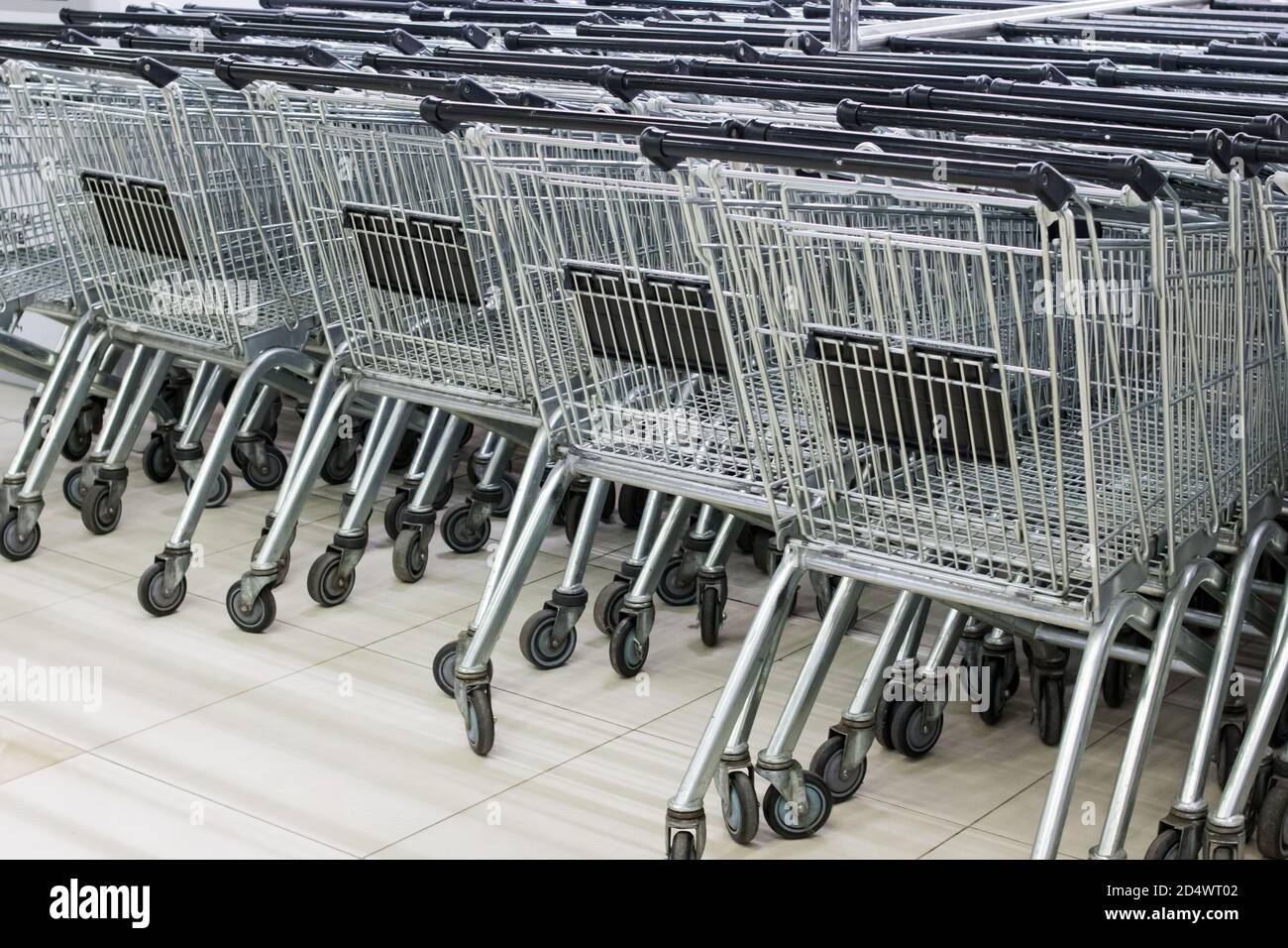 Many shopping cart on the sidewalk closeup Stock Photo - Alamy