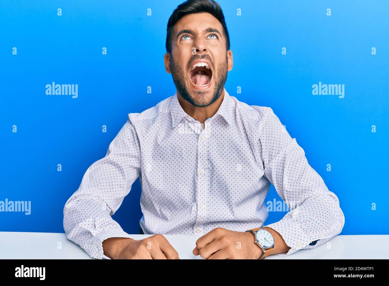 Angry enraged office worker shouting hi-res stock photography and ...