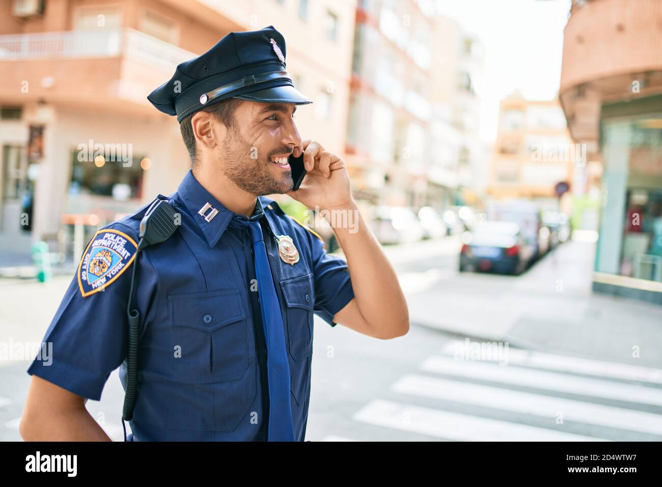 Authority communication smiling standing uniform hi-res stock ...