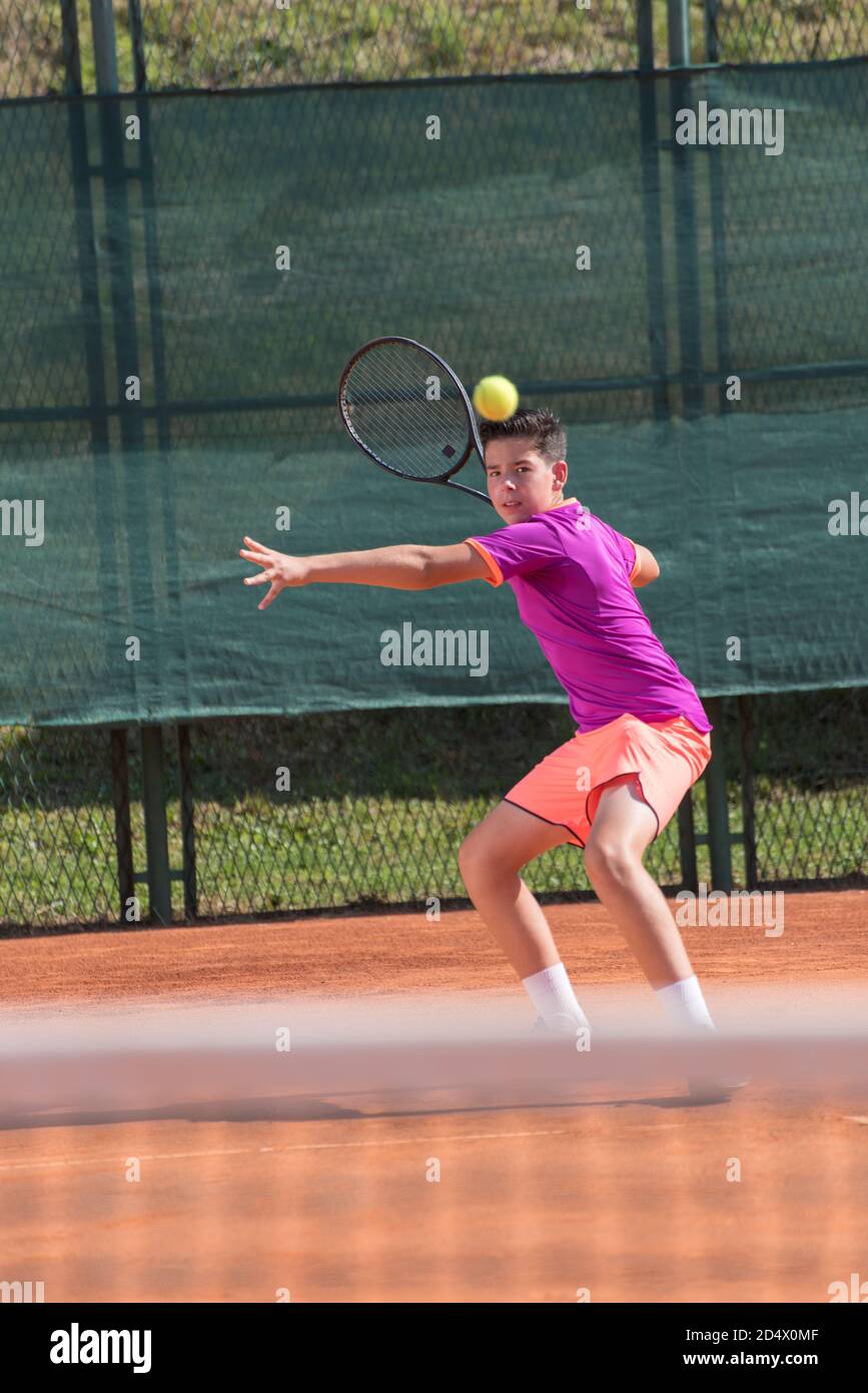 Tennis player hitting forehand hi-res stock photography and images - Alamy