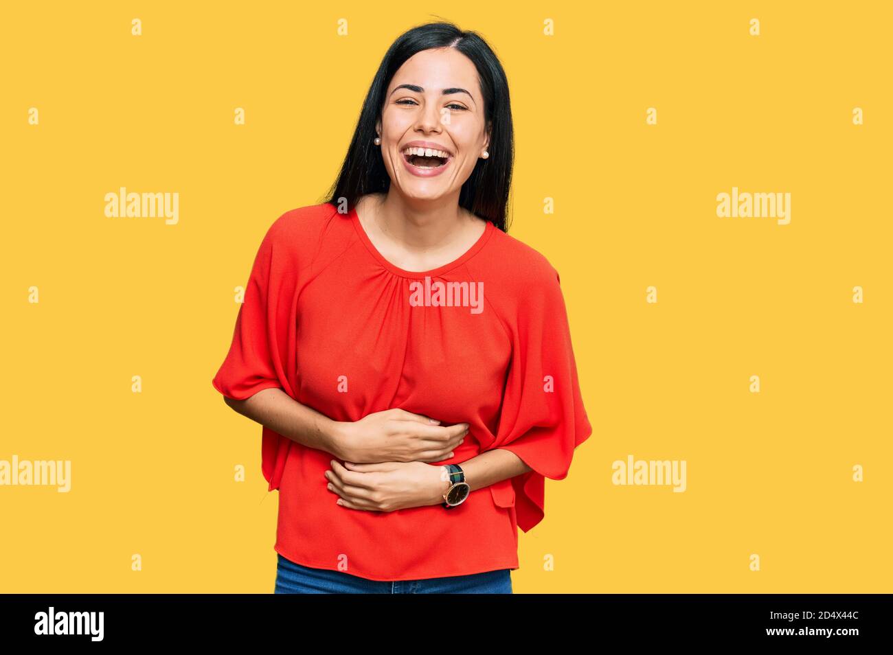 Beautiful Young Woman Wearing Casual Clothes Smiling And Laughing Hard