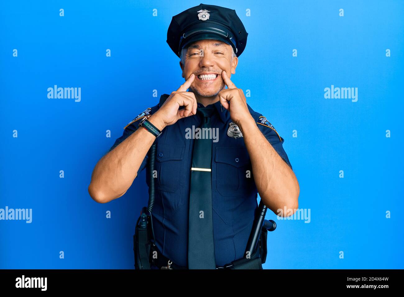Handsome middle age mature man wearing police uniform smiling with open ...