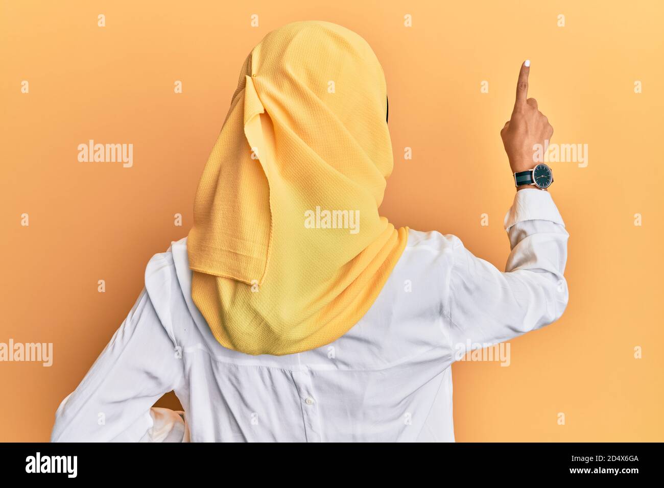 Young brunette arab woman wearing traditional islamic hijab scarf ...