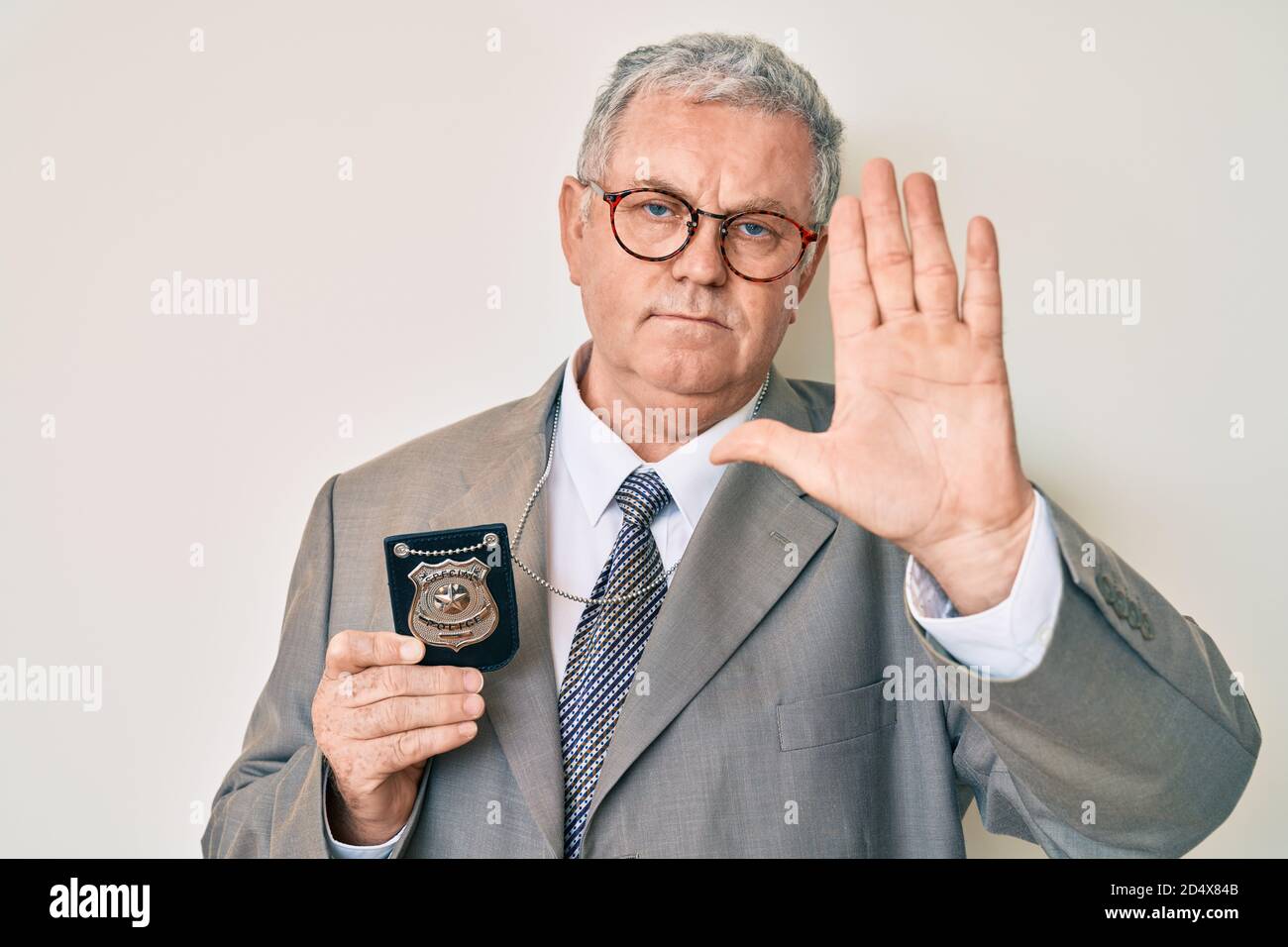 Police detective showing badge hi-res stock photography and images - Alamy