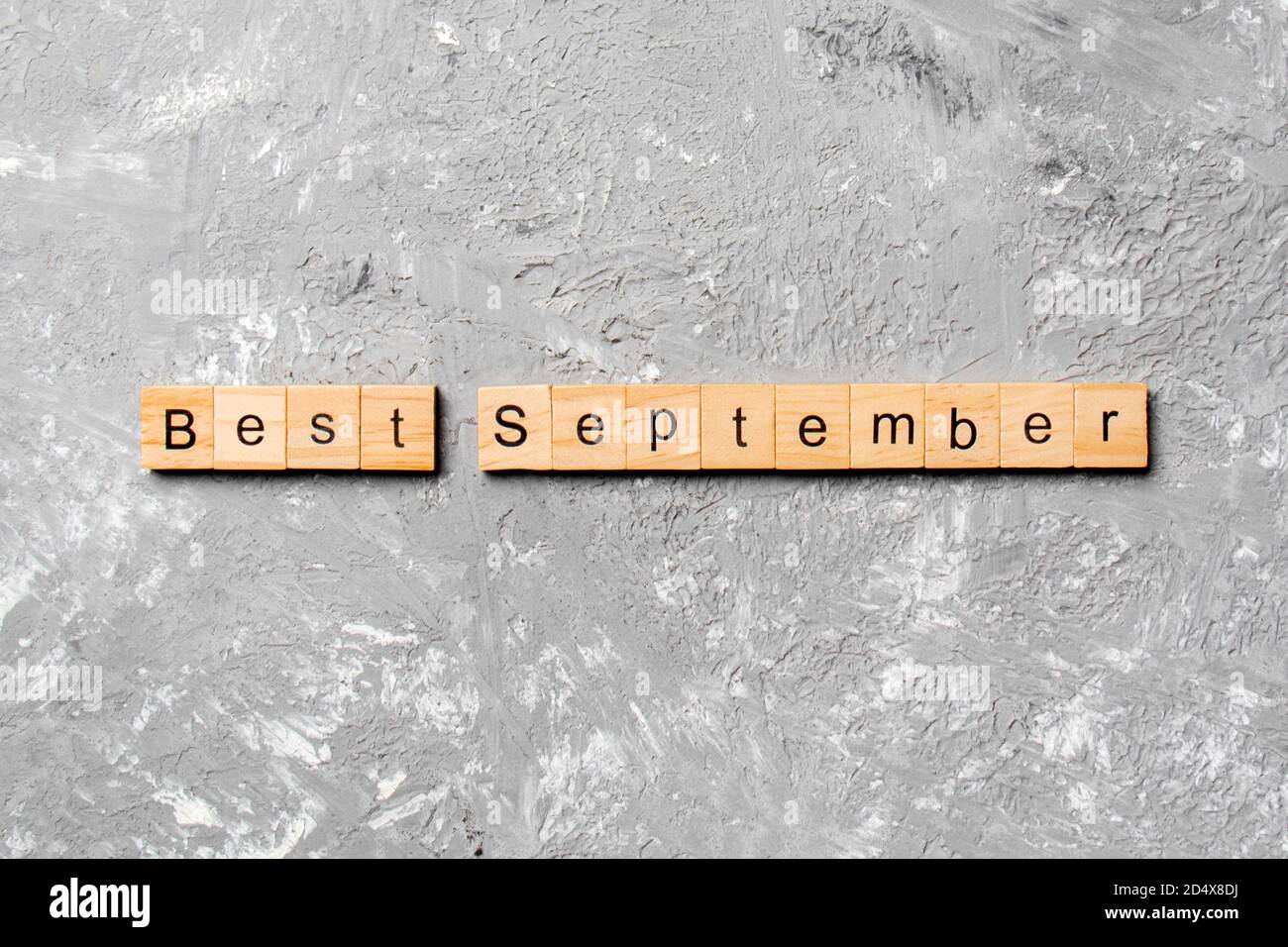 best september word written on wood block. best september text on table ...