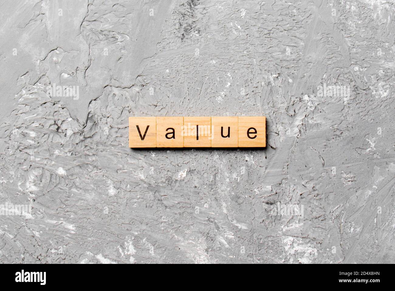 value word written on wood block. value text on table, concept Stock ...