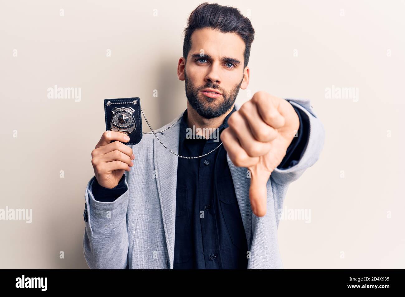 Police detective showing badge hi-res stock photography and images - Alamy