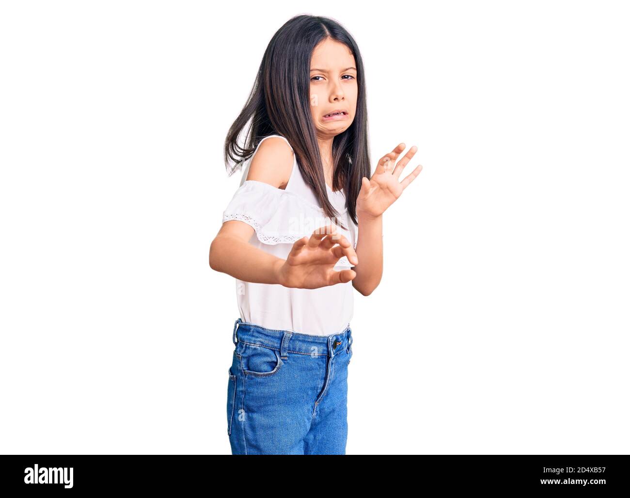 Beautiful child girl wearing casual clothes disgusted expression ...