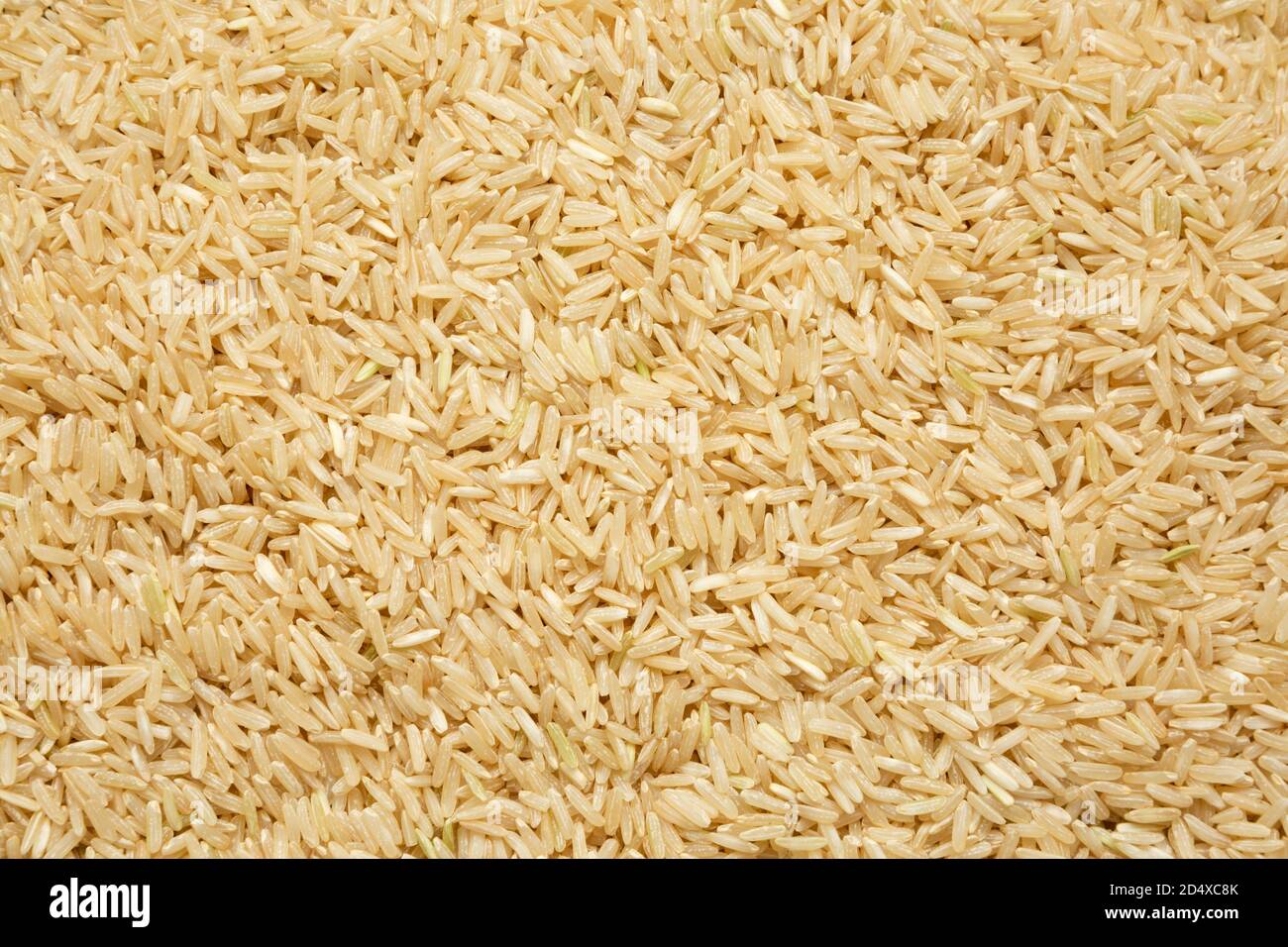 Dry Brown Rice background, top view. Overhead, from above, flat lay ...