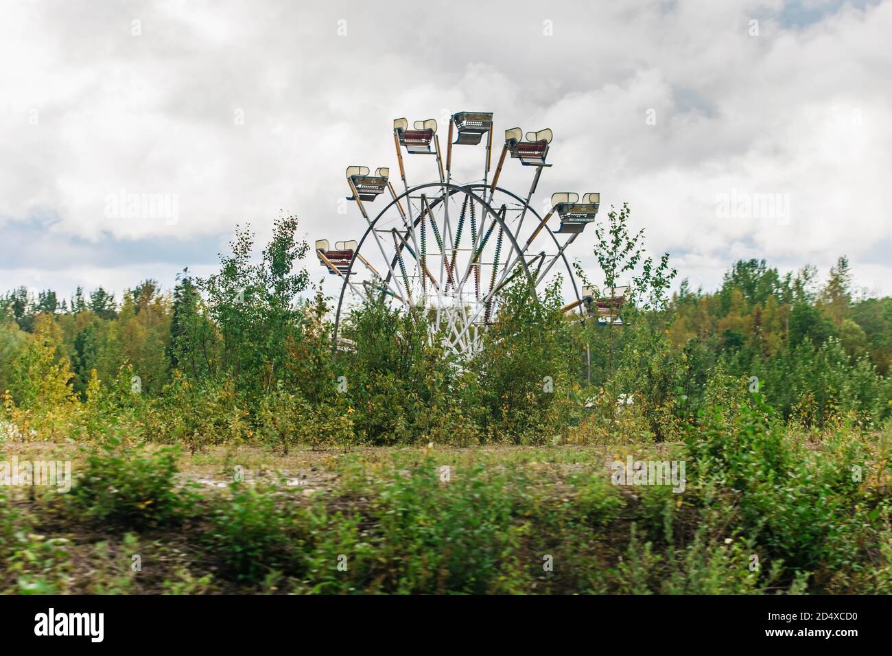 An old broken rusty carousel in the middle of nowhere at fall Stock ...