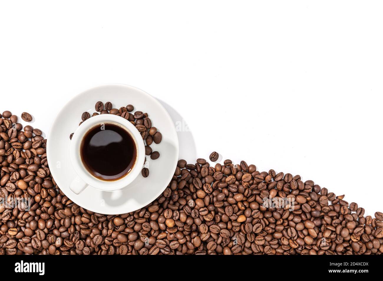 Cup of Espresso Coffee and roasted beans on white background. Coffee ...