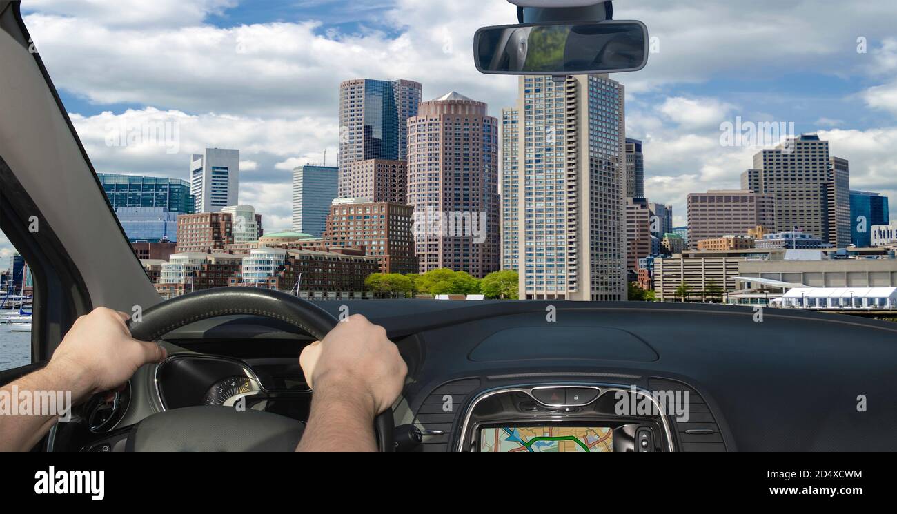 Driving a car towards the scenic skyline of Boston, Massachusetts, USA ...