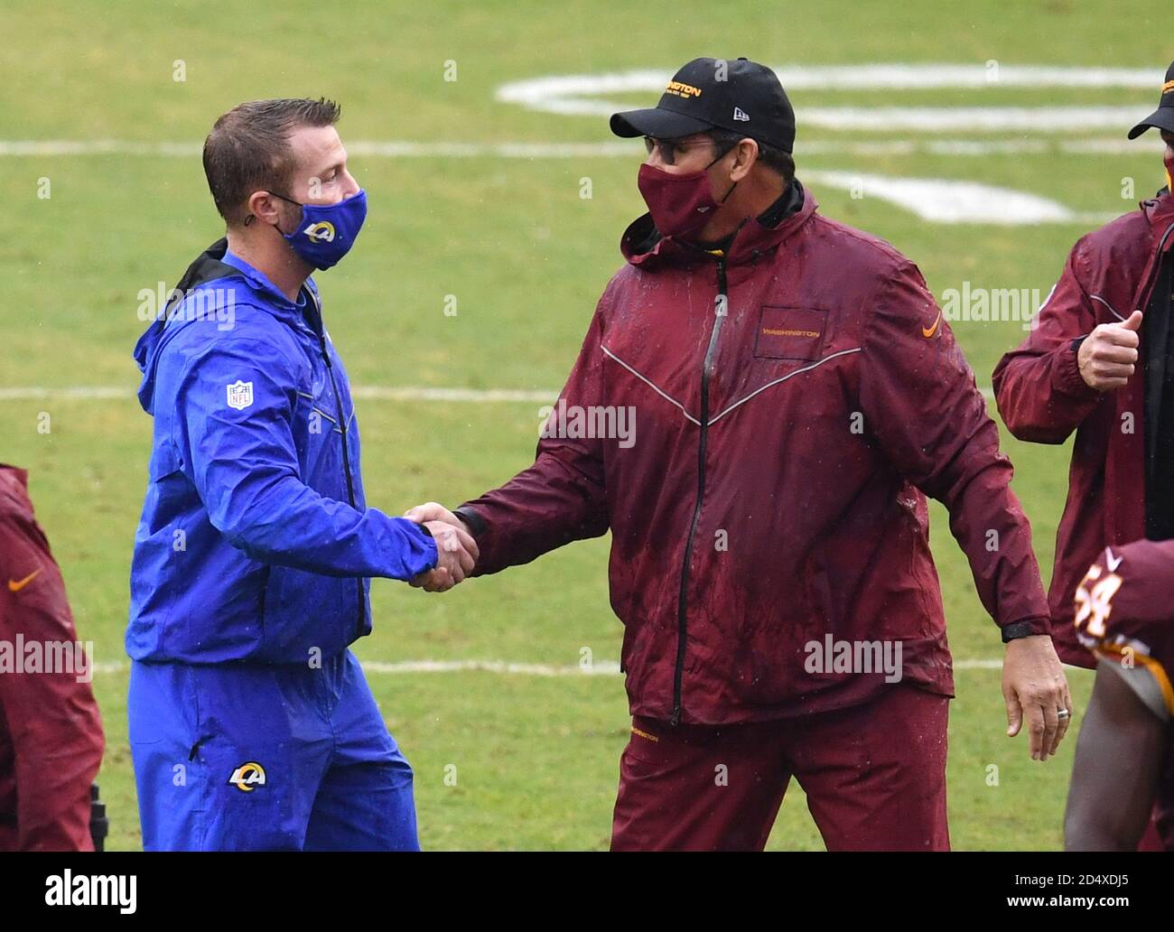 Football hands on head hi-res stock photography and images - Alamy