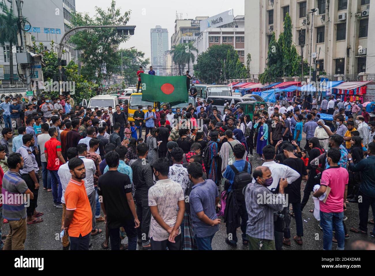 Bangladeshi students take part in an ongoing protest demanding justice ...