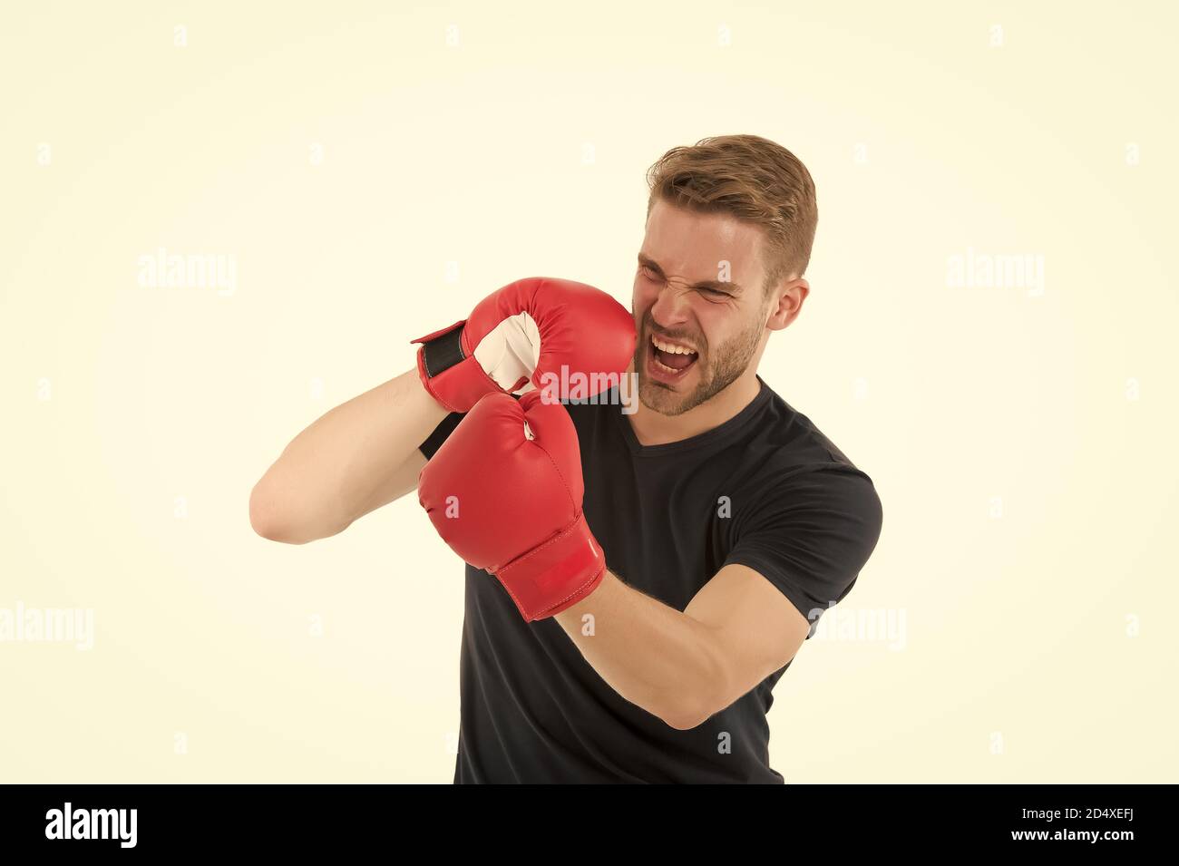 Defence skill. Boxer handsome strict coach. Sportsman boxer with gloves ...
