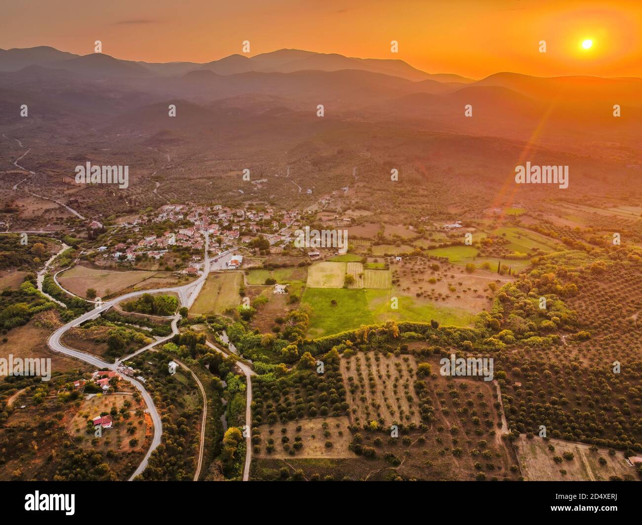 Aerial view of small village and crop fields at dusk Stock Photo - Alamy