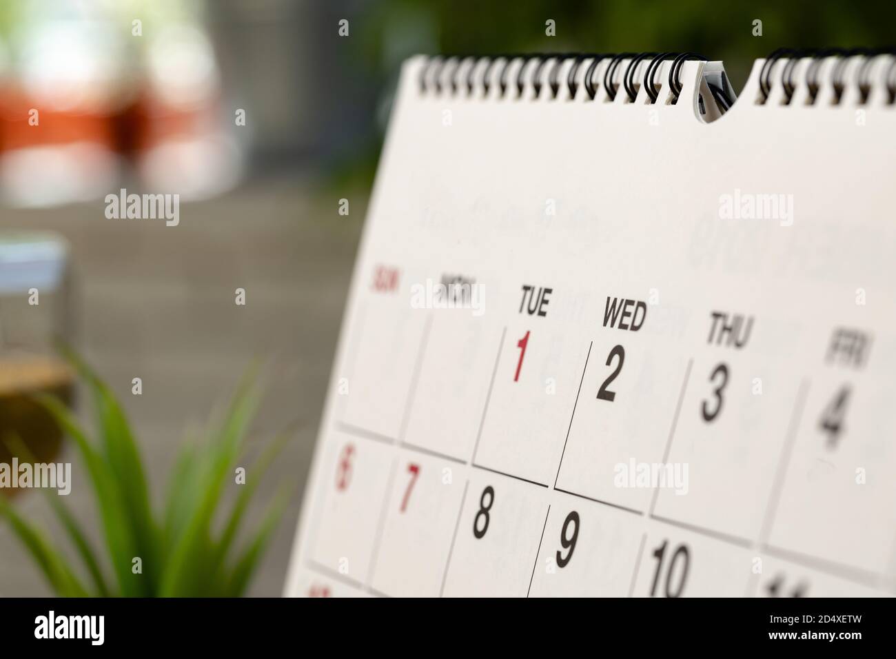 Calendar page close up on office desk Stock Photo - Alamy