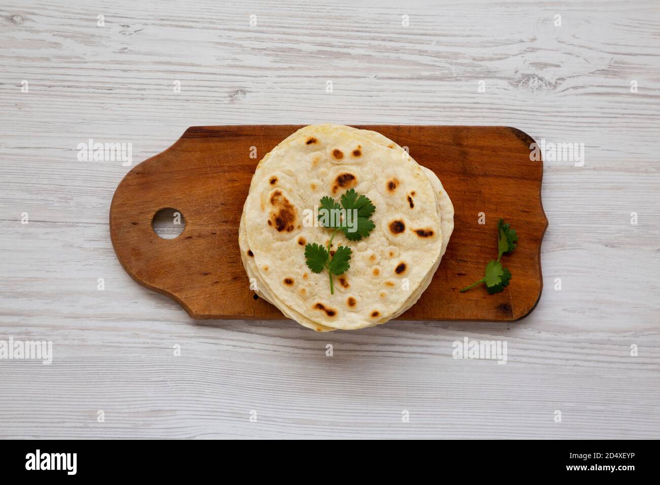 Homemade Roti Chapati Flatbread on a rustic wooden board, top view ...