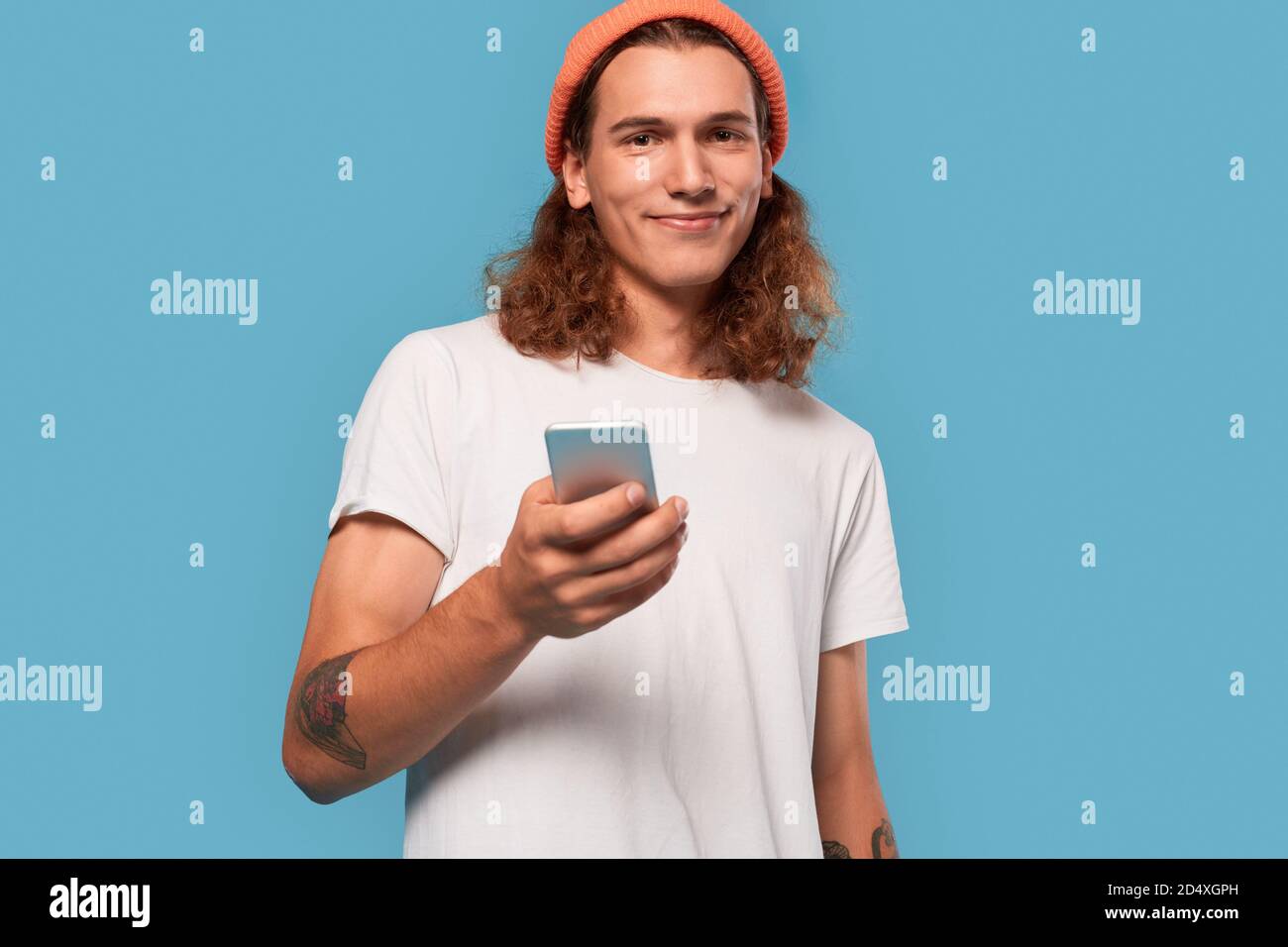 Young guy curly hair using hi-res stock photography and images - Alamy