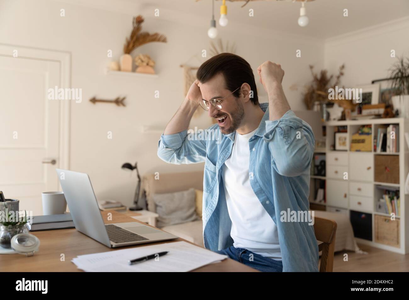 Man raising their arms in the air hi-res stock photography and images ...