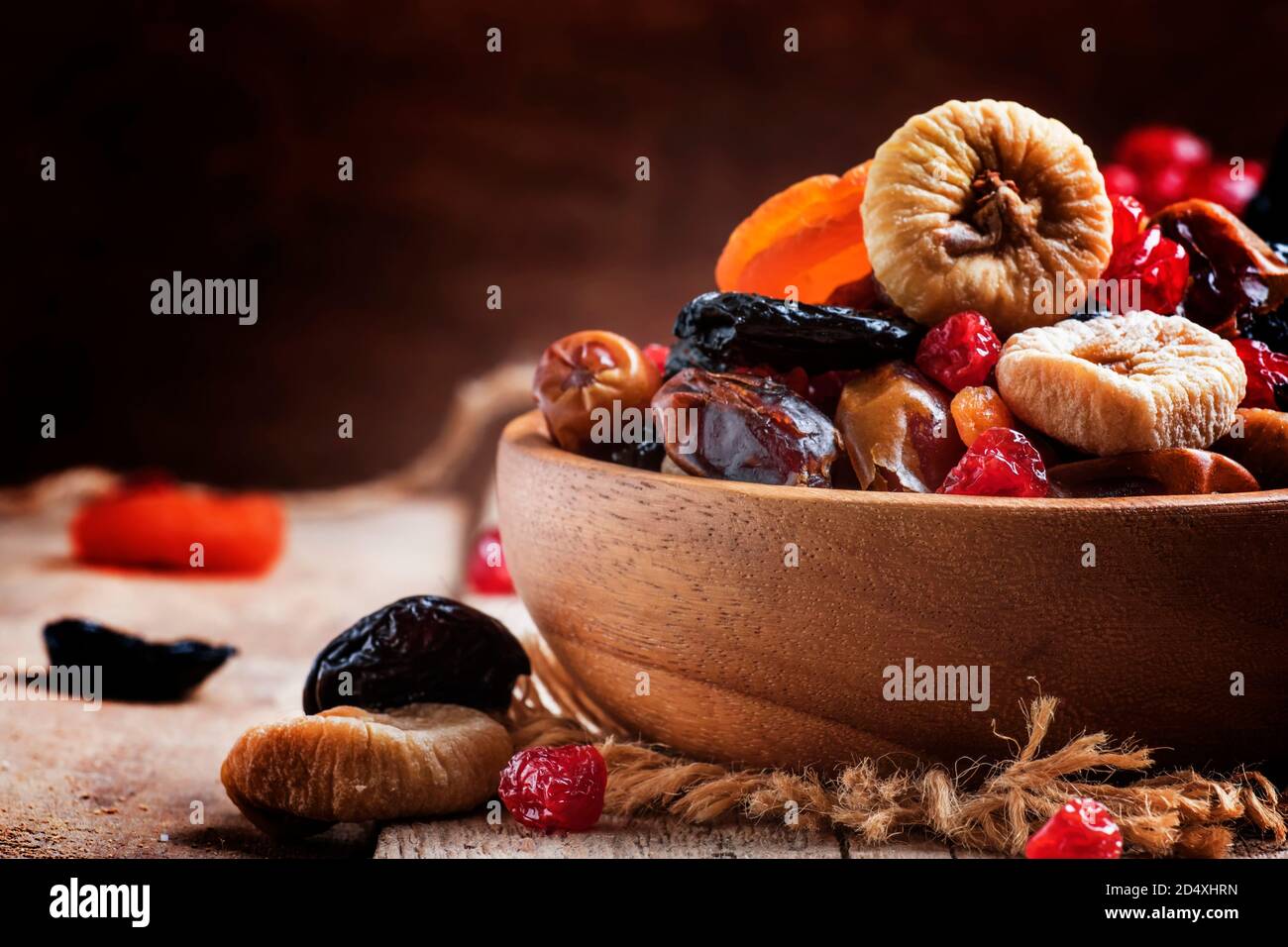 Healthy food: mix from dried fruits in bowl, old wooden background ...