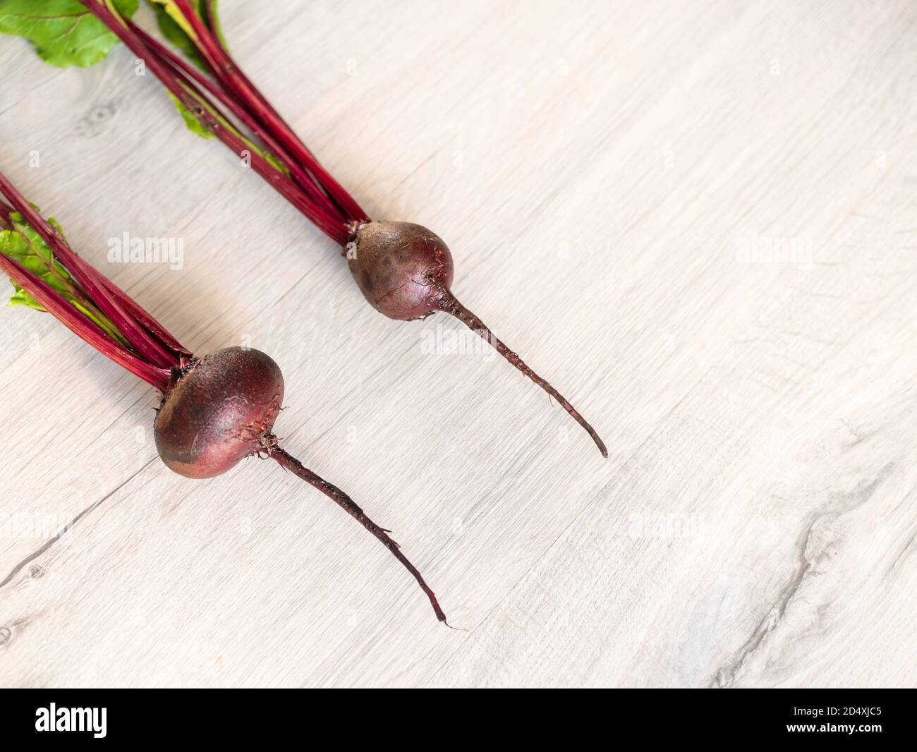Fresh beautiful washed beets on a light background Stock Photo - Alamy