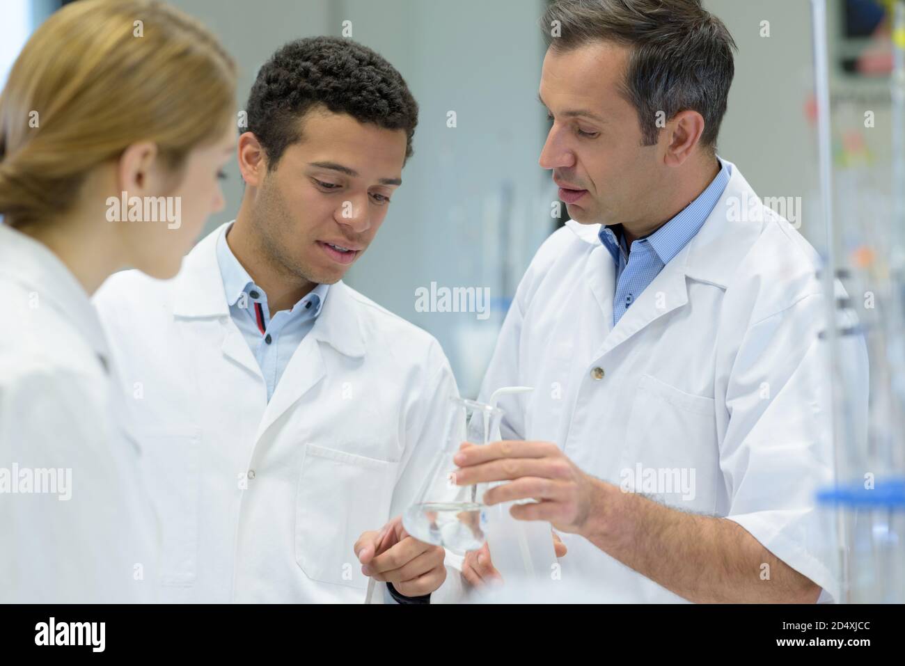 students and professor in science lab Stock Photo - Alamy