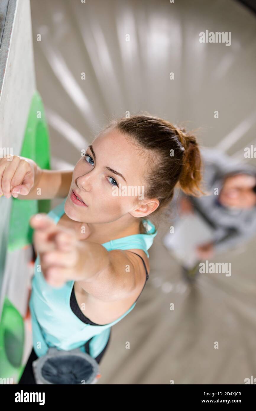 woman climbing on the wall Stock Photo - Alamy