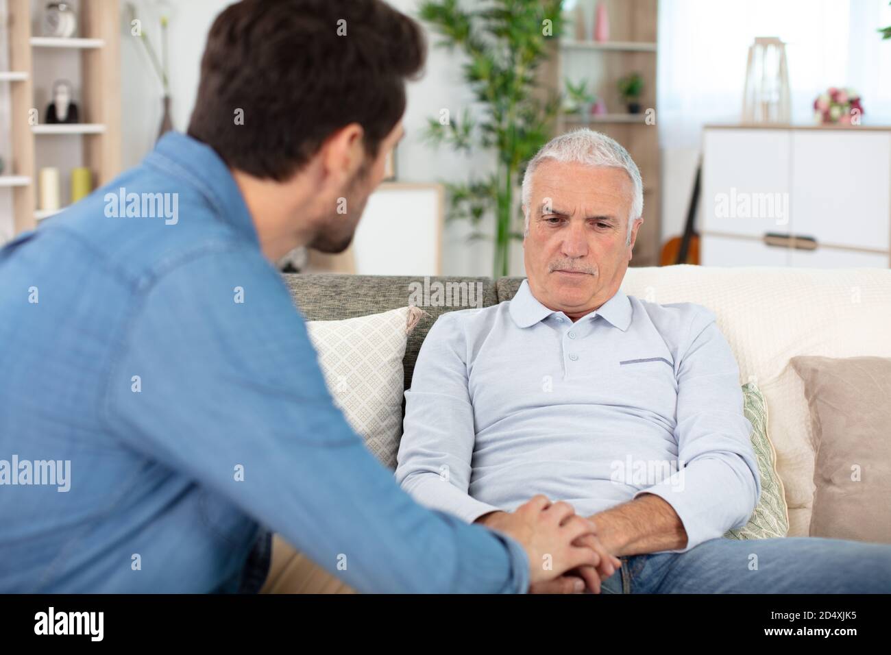 Grandfather father son sad hi-res stock photography and images - Alamy