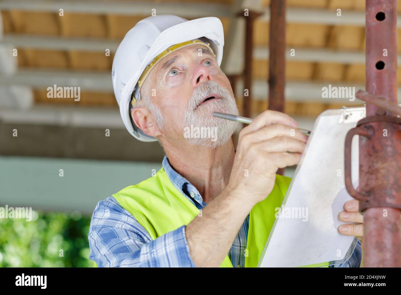 confident service man taking notes Stock Photo - Alamy