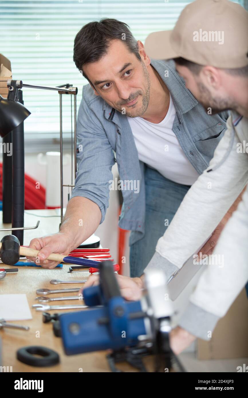 worker with apprentice Stock Photo - Alamy
