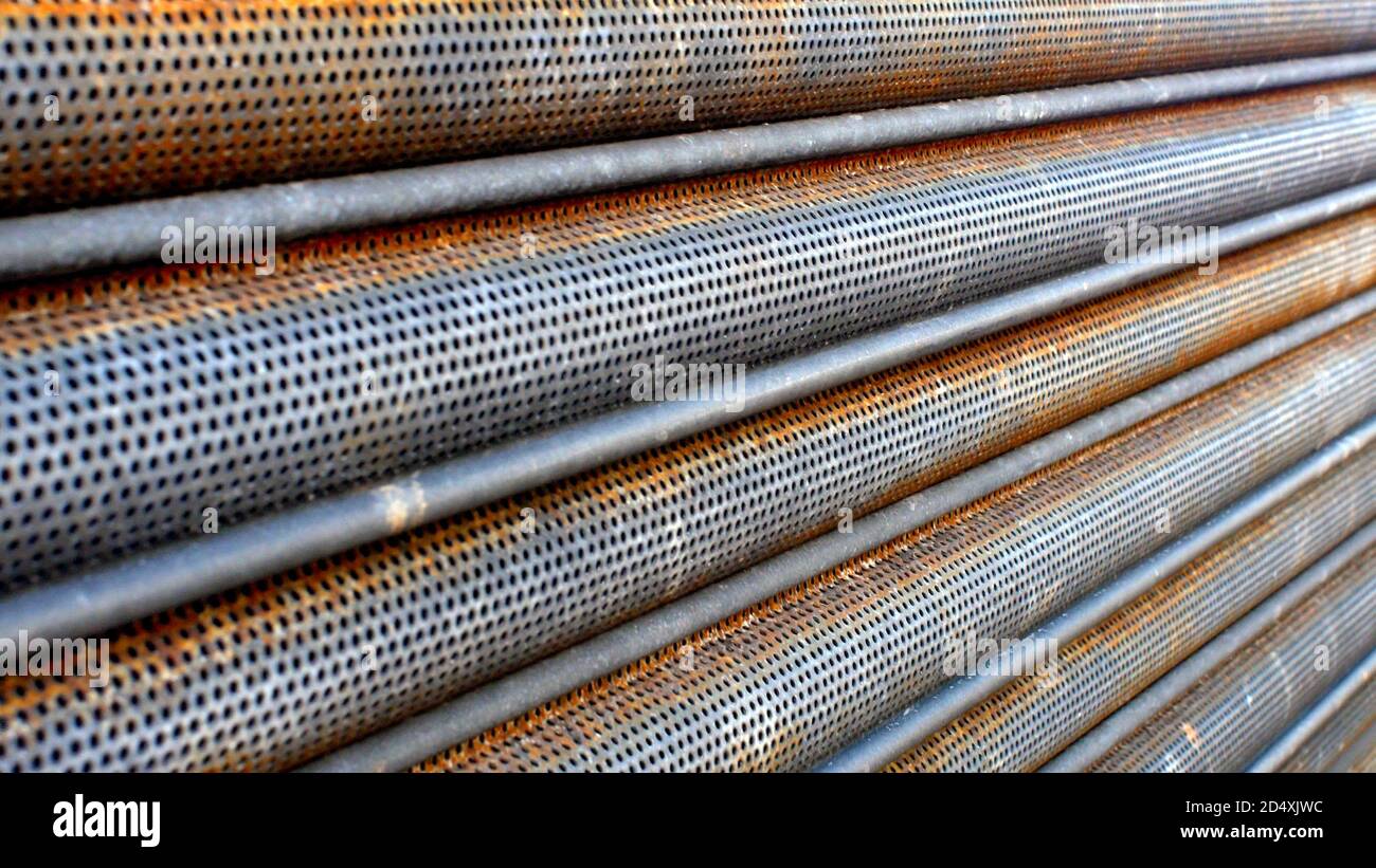 Rusty metal texture with holes Stock Photo - Alamy