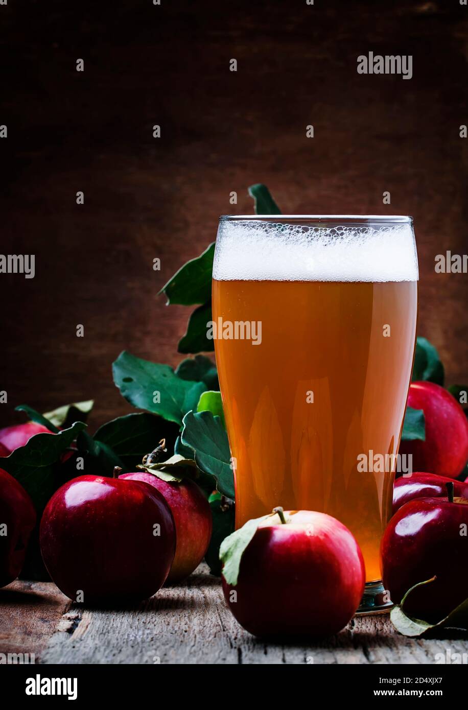 Apple cider in a large beer glass, black background, top view Stock ...