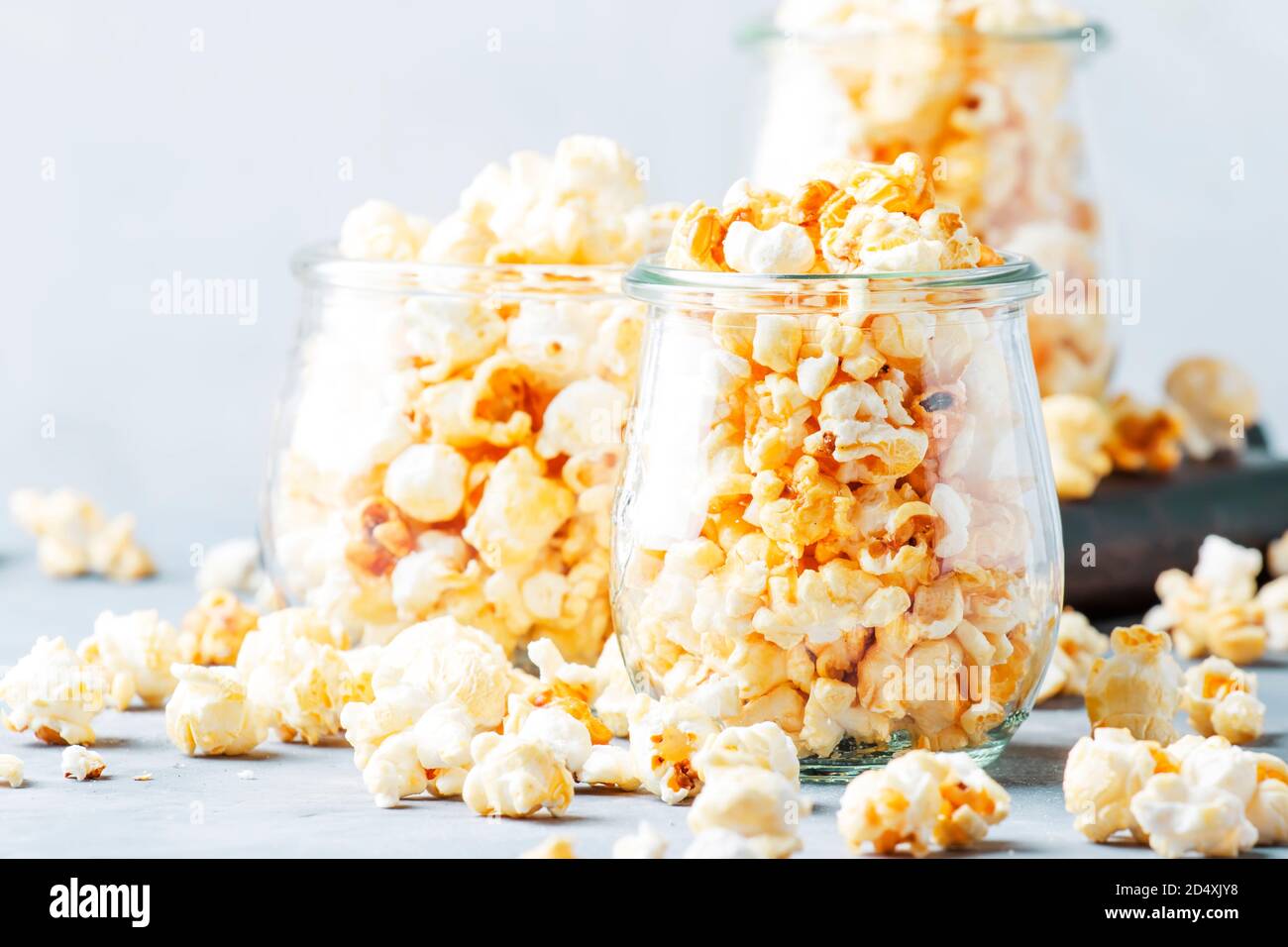 Sweet popcorn, junk food, gray background, selective focus Stock Photo ...