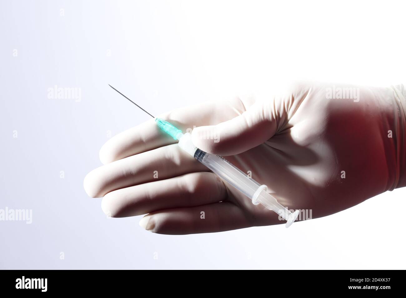 Syringe, medical injection in the hand, palm or fingers. Plastic ...